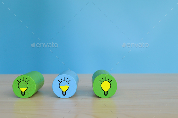 Wooden block with light bulb symbols. Business success and create idea concept Stock Photo by ...